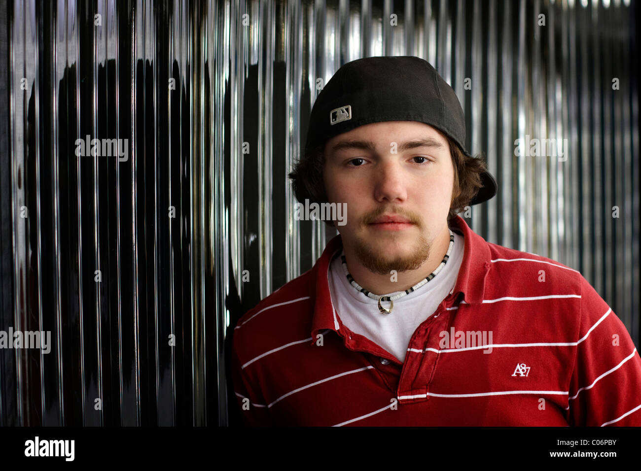 Man wearing baseball cap backwards hi-res stock photography and images ...