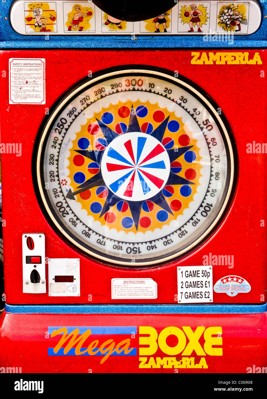 A brightly coloured colored fairground machine for boxing Stock Photo ...