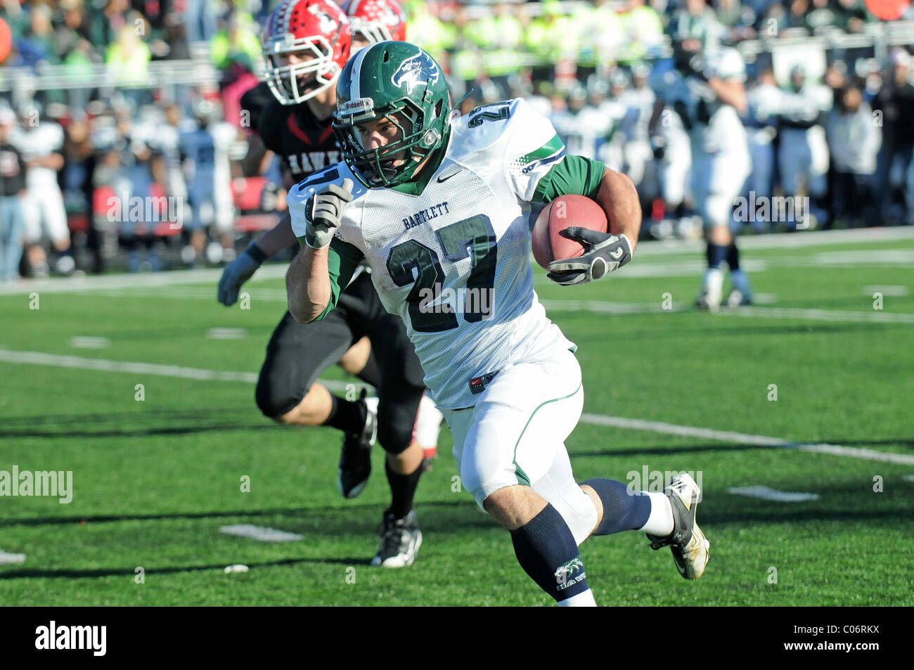 Running back running to daylight as he breaks into the open on his way ...
