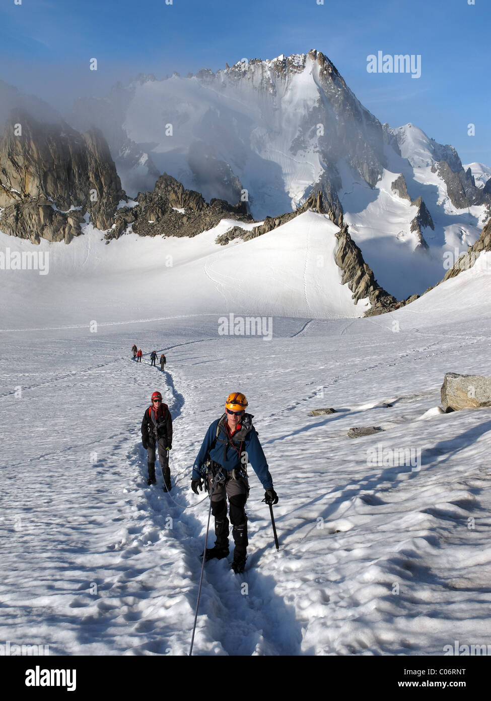 Alpine climbers on the Trient glacier approaching the Aiguille du Tour ...