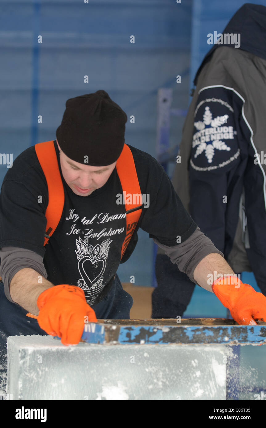Teams of professional ice carvers work together to build massive ice ...