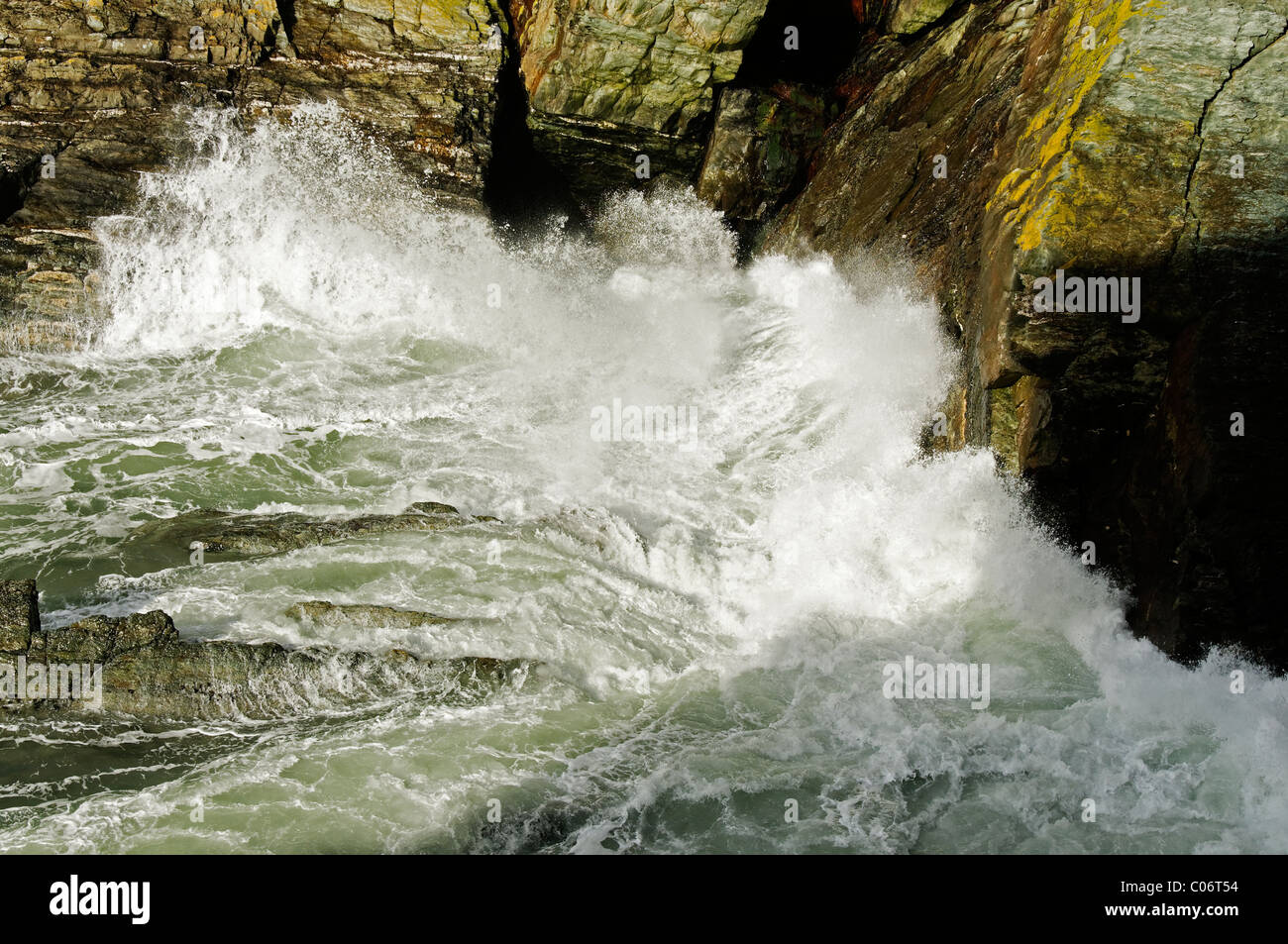Breaking waves in Mousetrap Zawn, Anglesey Stock Photo - Alamy