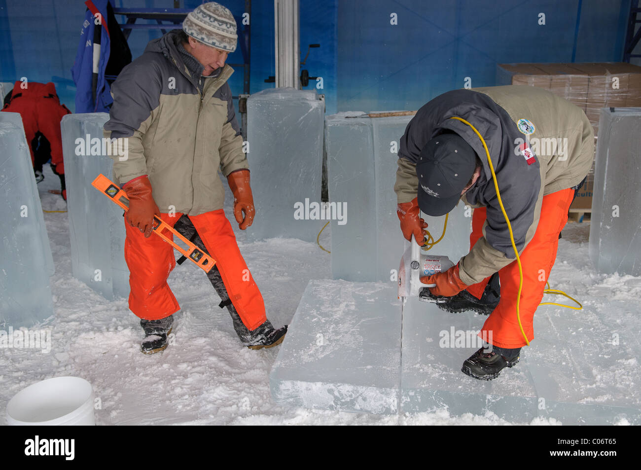Teams of professional ice carvers work together to build massive ice ...