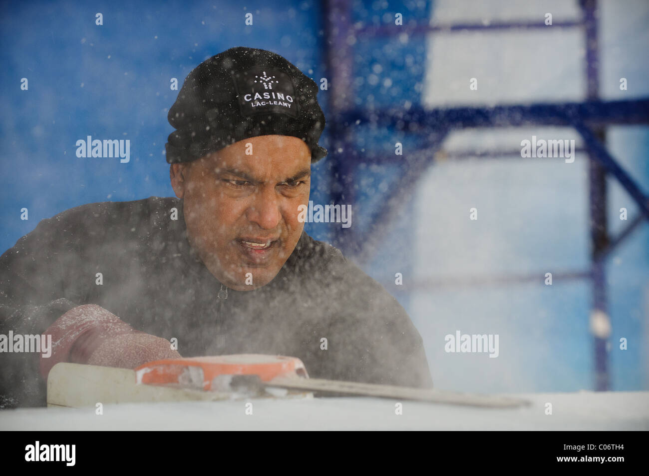 Teams of professional ice carvers work together to build massive ice ...