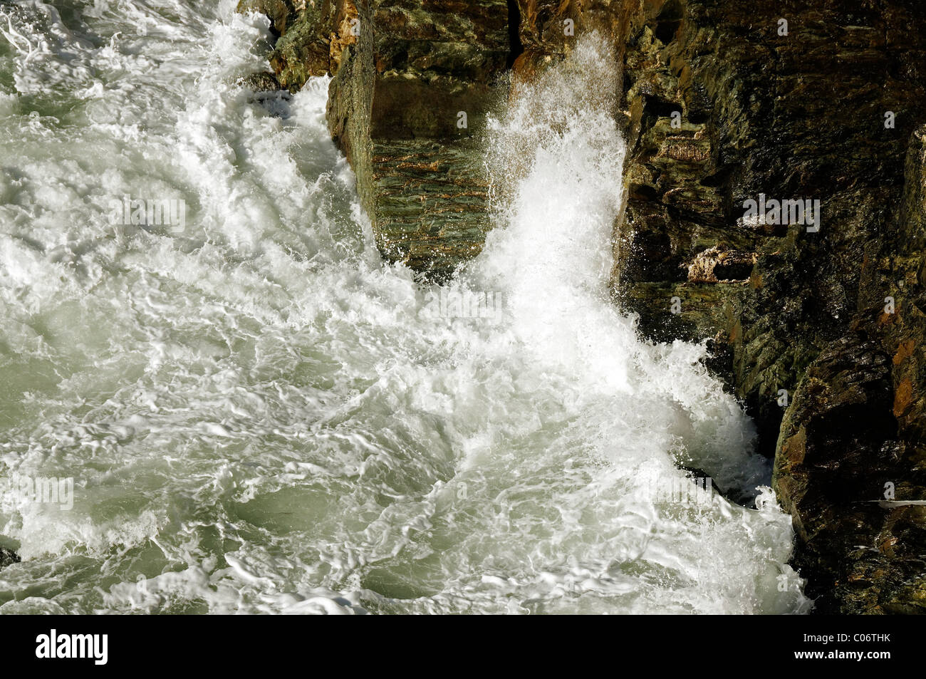 Breaking waves in Mousetrap Zawn, Anglesey Stock Photo - Alamy
