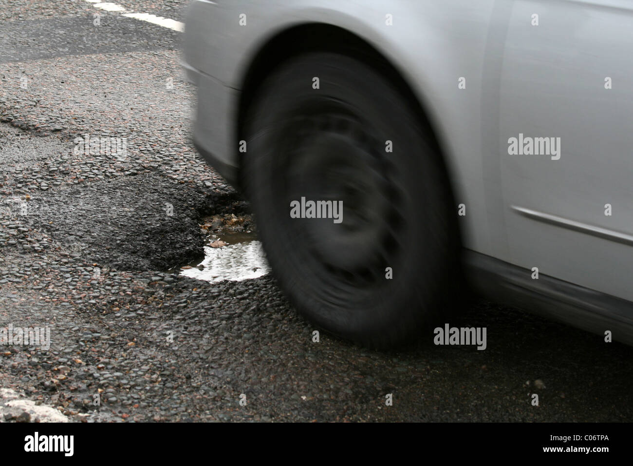 Pothole car hi-res stock photography and images - Alamy