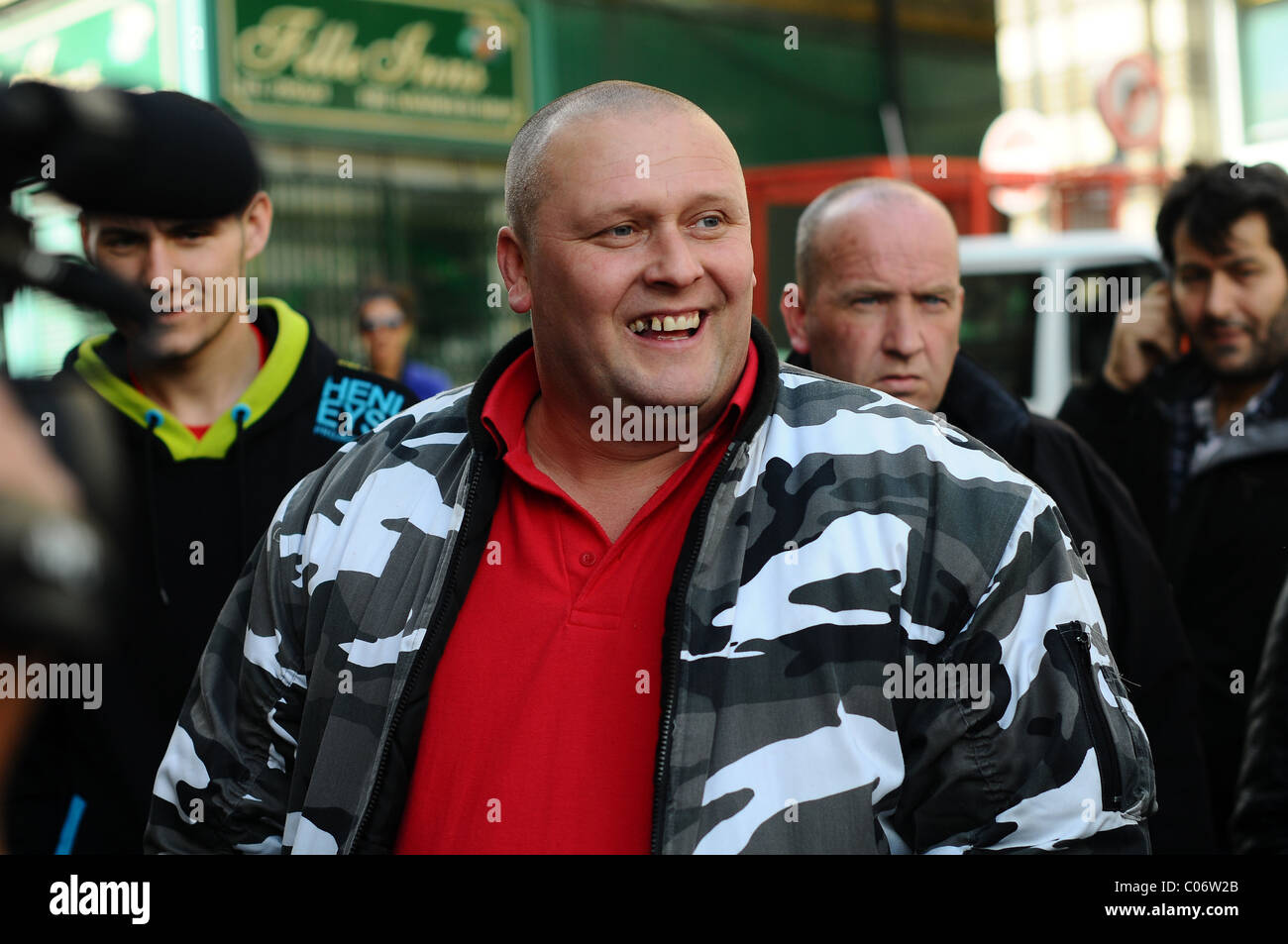 EDL supporter with bodyguards in Bradford Stock Photo - Alamy