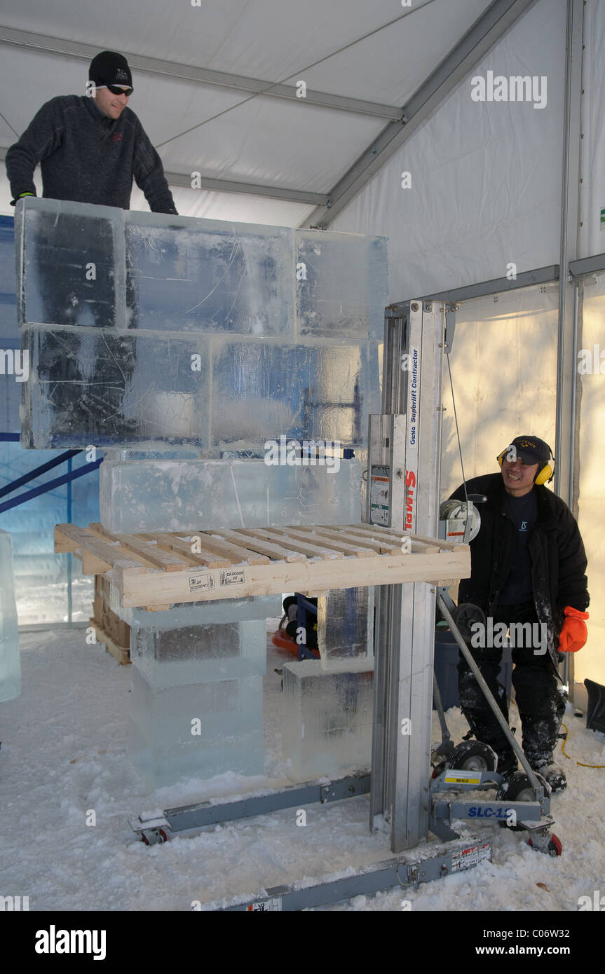 Teams of professional ice carvers work together to build massive ice ...