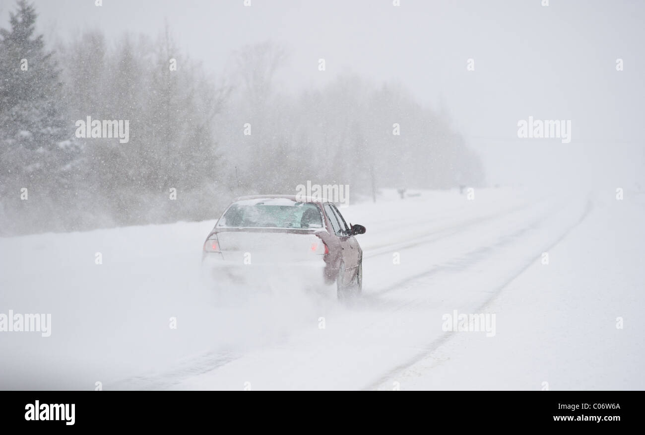 Driving in a snow storm in Eastern Canada Stock Photo - Alamy