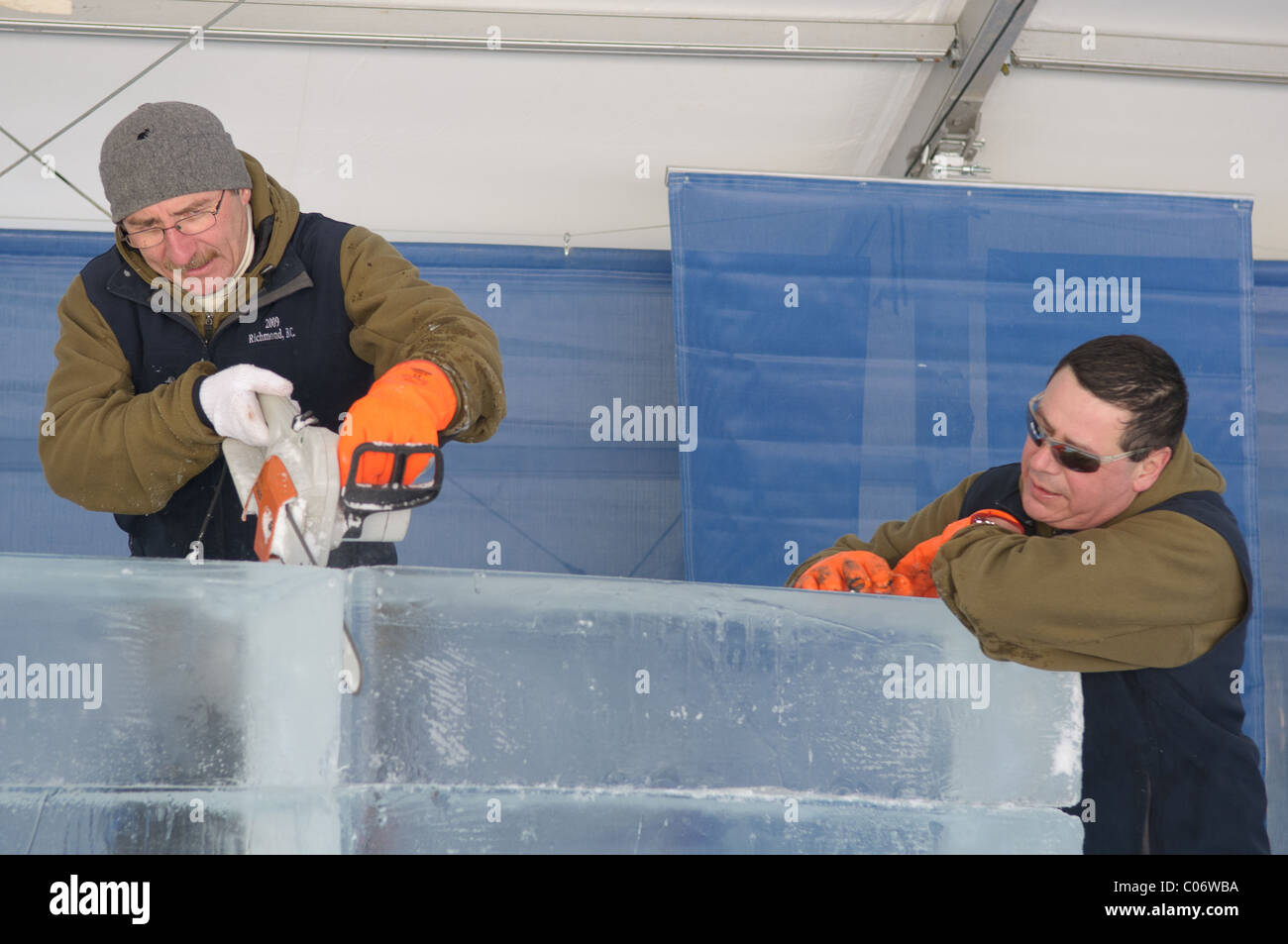 Teams of professional ice carvers work together to build massive ice ...