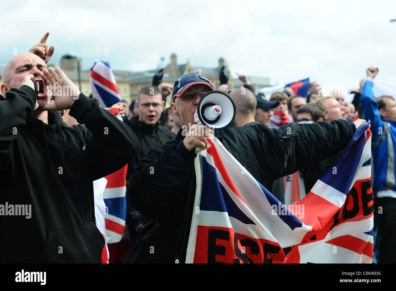 EDL supporters chants England songs at the UAF crowd Stock Photo - Alamy