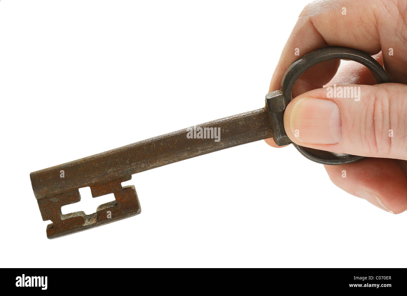 hand holding an old rusted key Stock Photo - Alamy