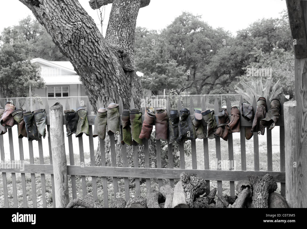 Cowboy boot on fence hi-res stock photography and images - Alamy
