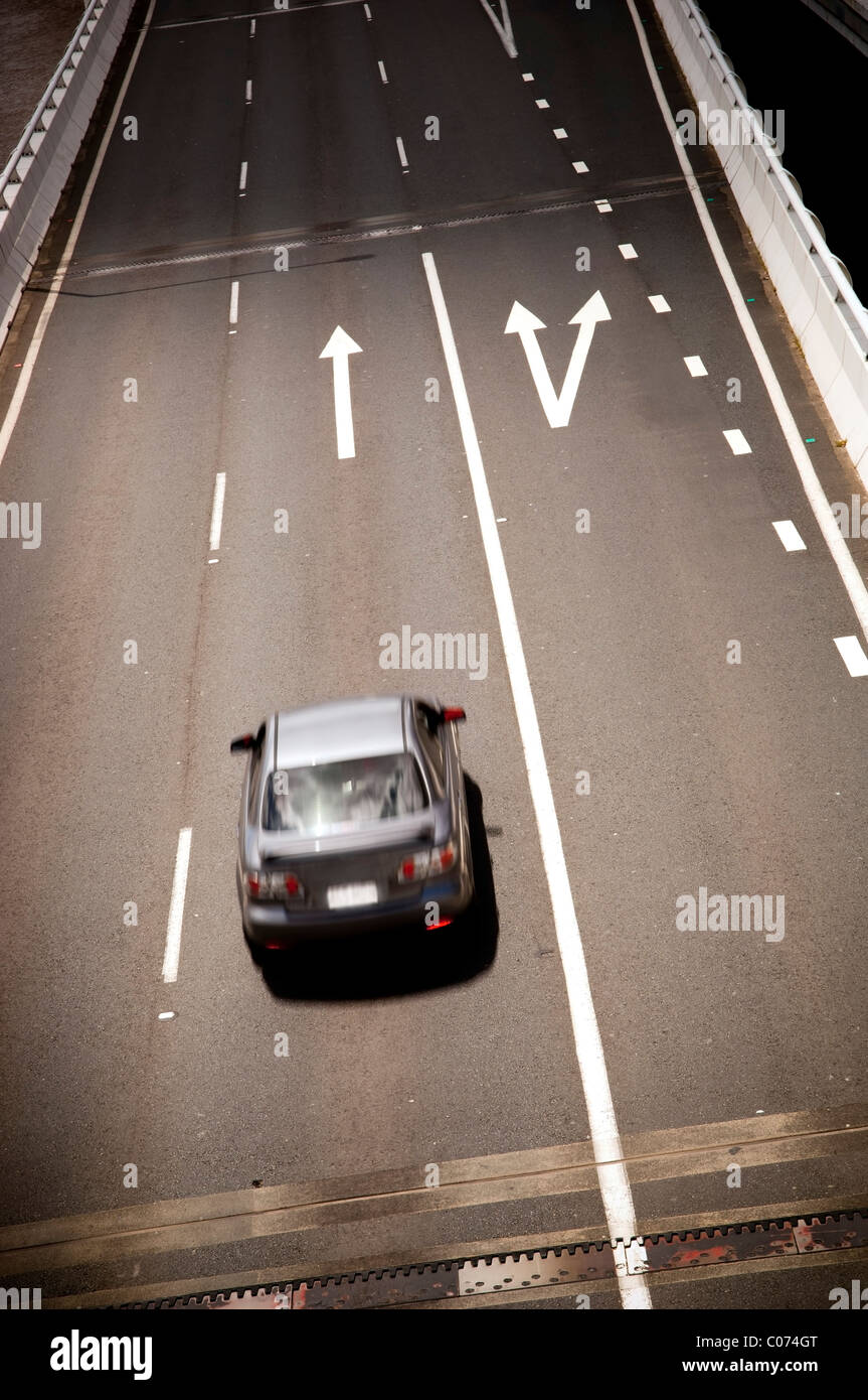 Car with road direction arrows hi-res stock photography and images - Alamy