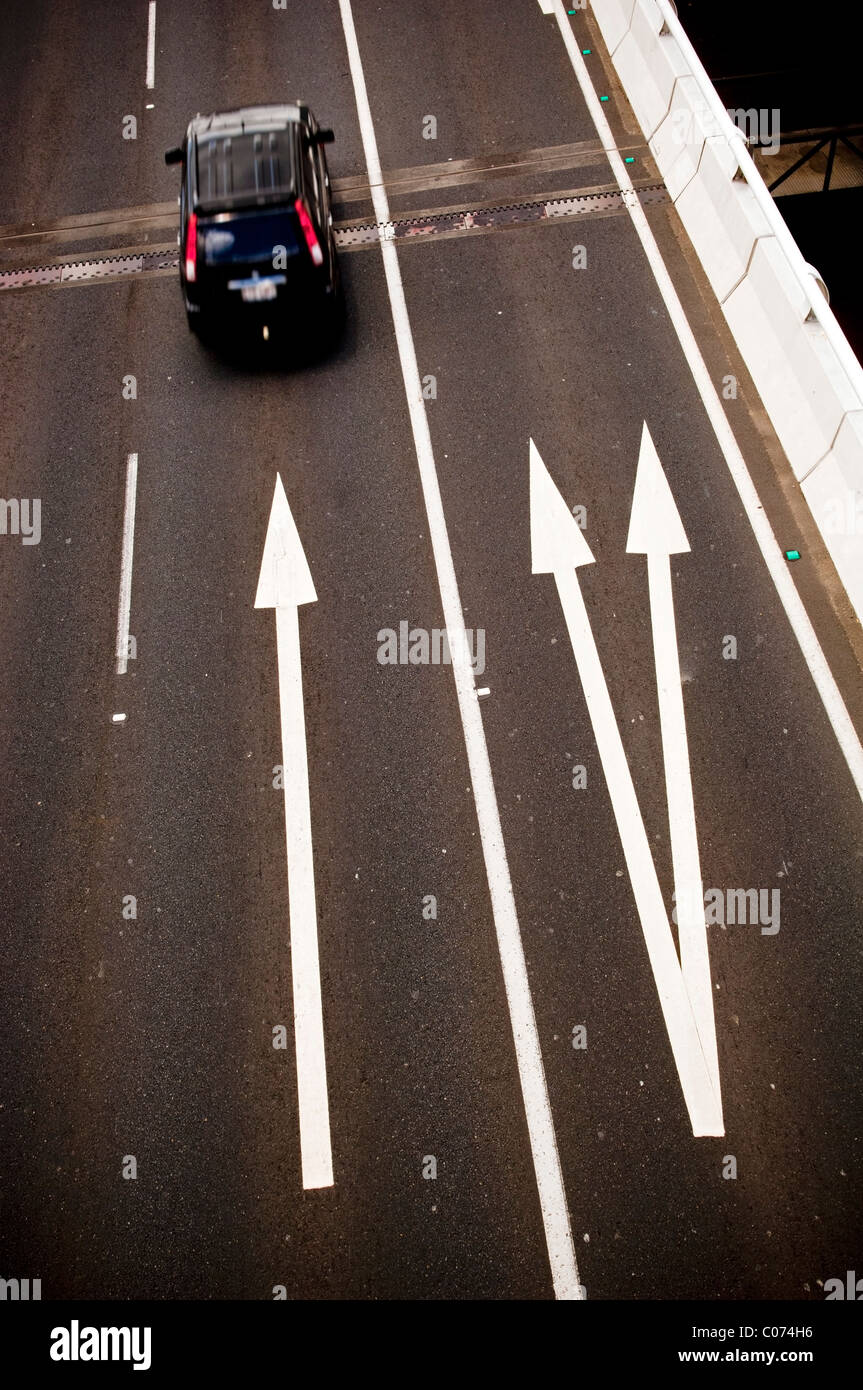 Car with road direction arrows hi-res stock photography and images - Alamy