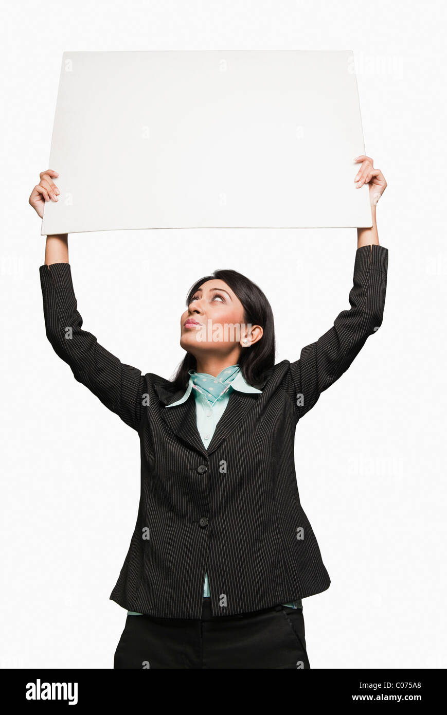 Person holding blank sign over head hi-res stock photography and images ...