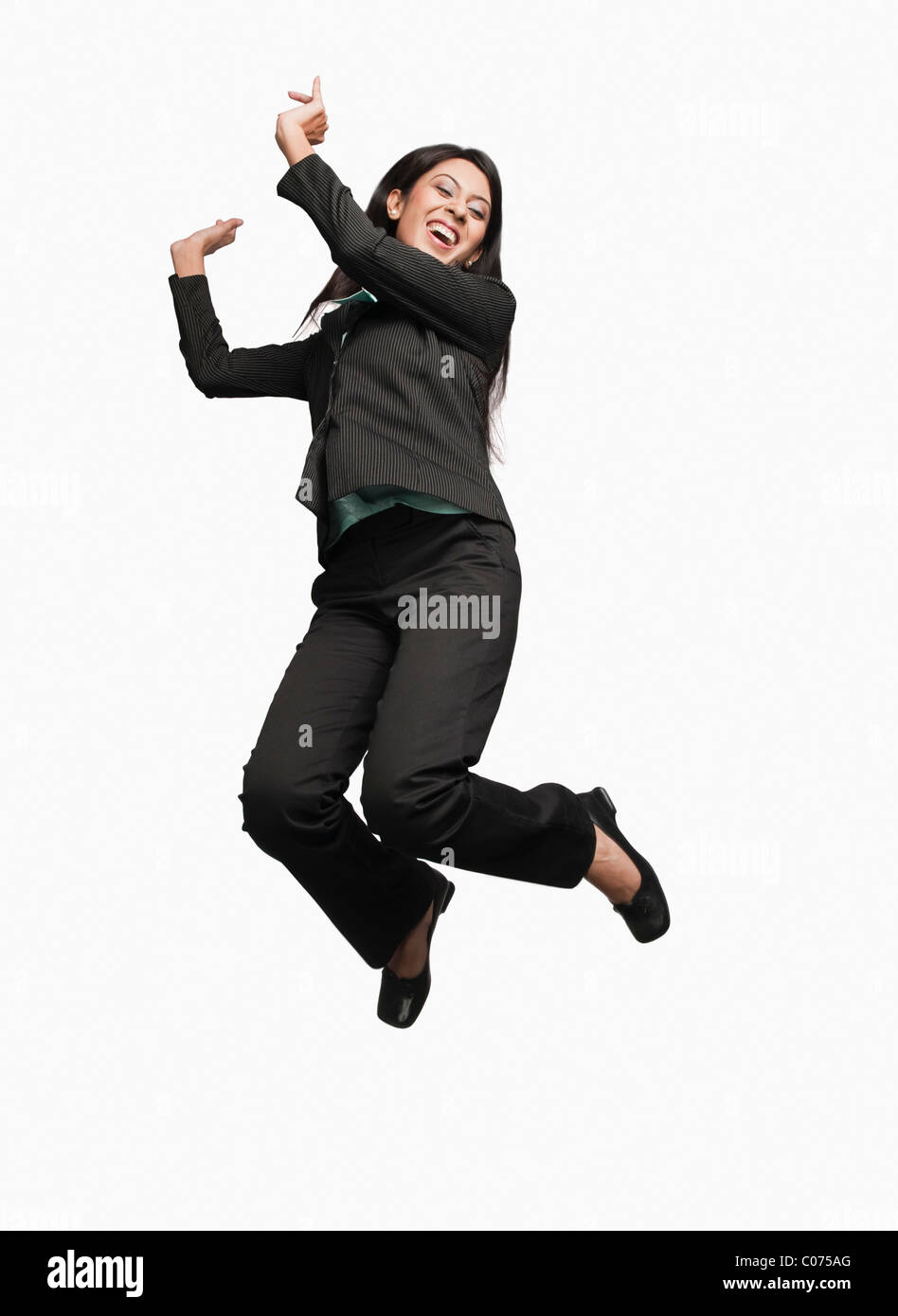Woman jumping for joy office Cut Out Stock Images & Pictures - Alamy