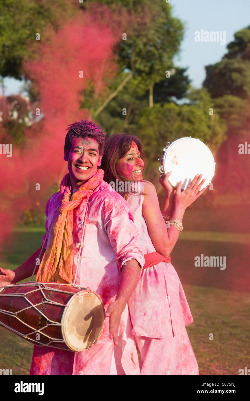 Portrait indian men playing holi hi-res stock photography and images ...