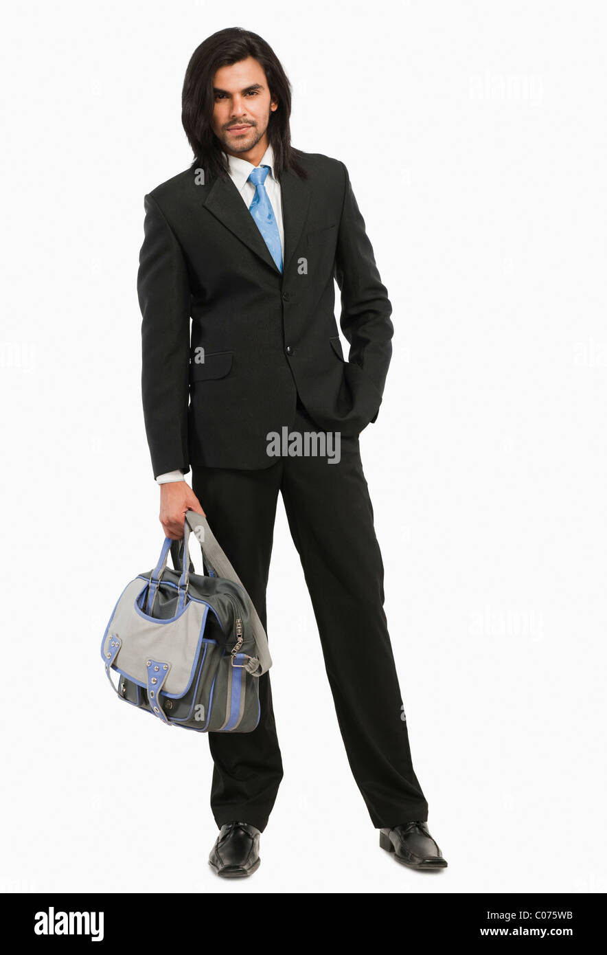 Man holding bag in Cut Out Stock Images & Pictures - Alamy