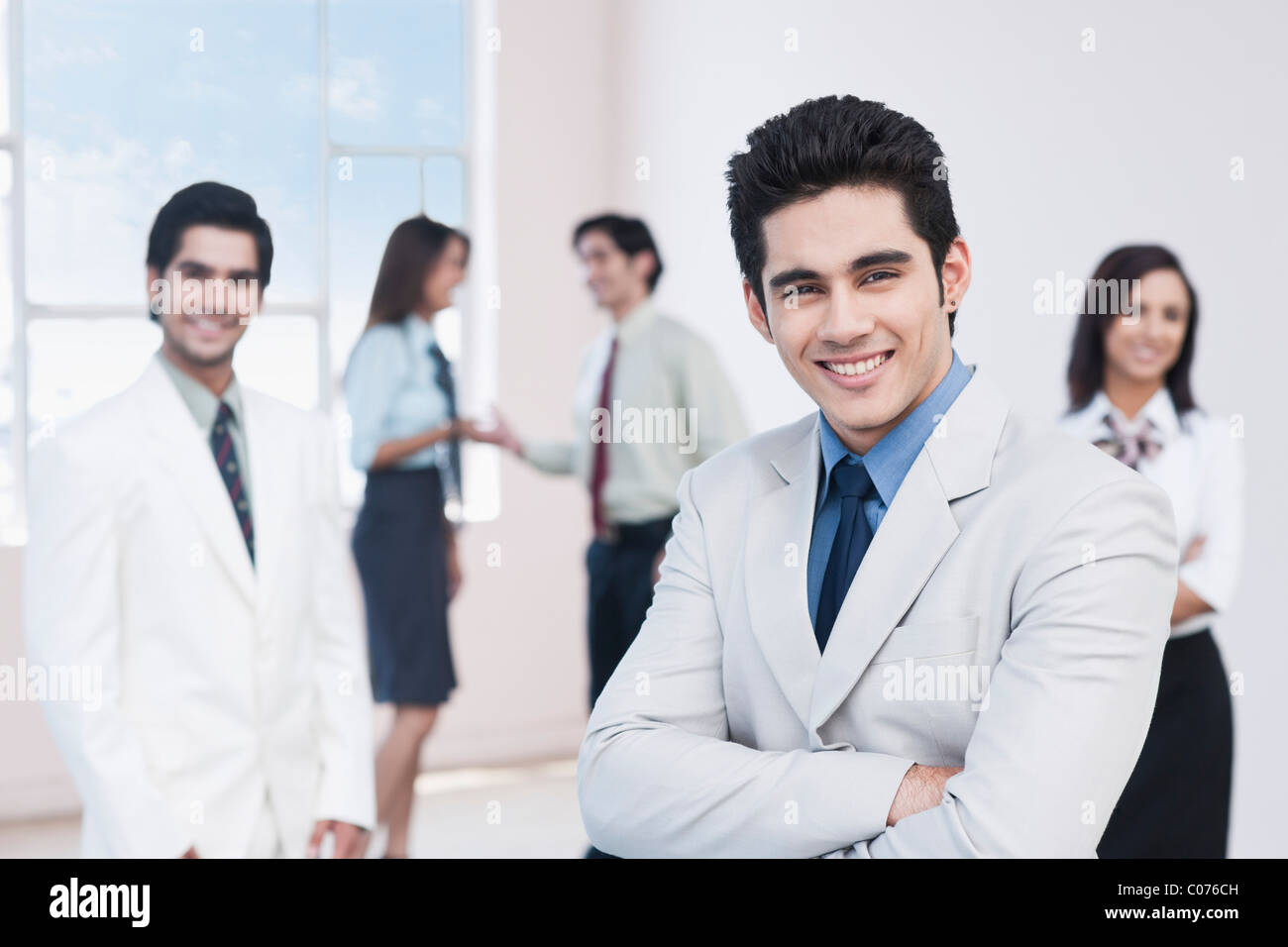 Portrait of a businessman smiling Stock Photo - Alamy