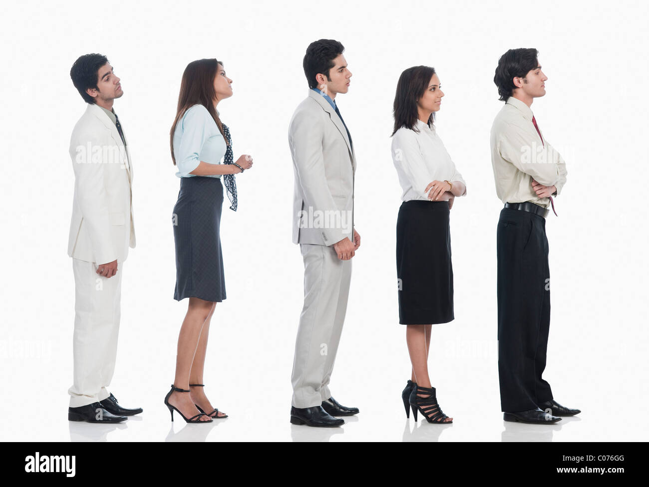 Business executives waiting in a line Stock Photo - Alamy