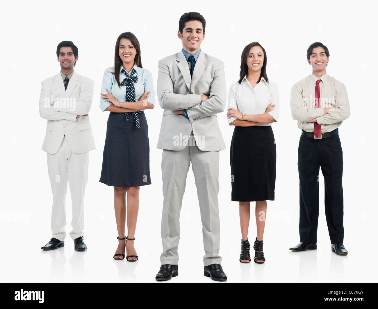 Business executives standing with arms crossed Stock Photo - Alamy