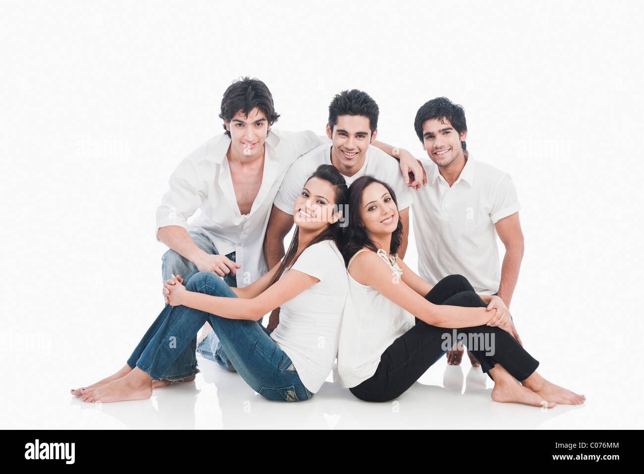 Group of friends smiling Stock Photo - Alamy