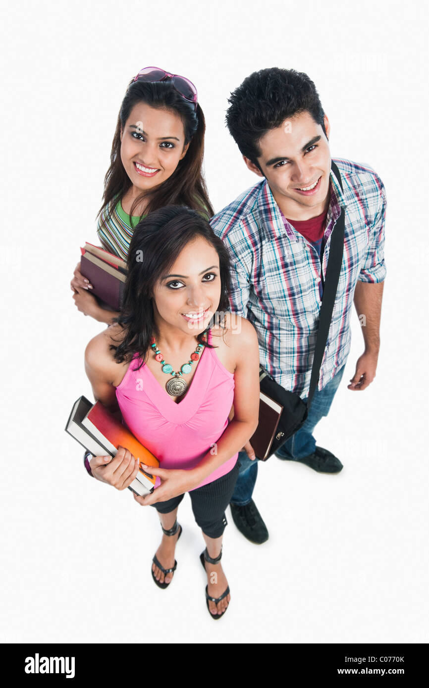 College friends smiling together Stock Photo - Alamy