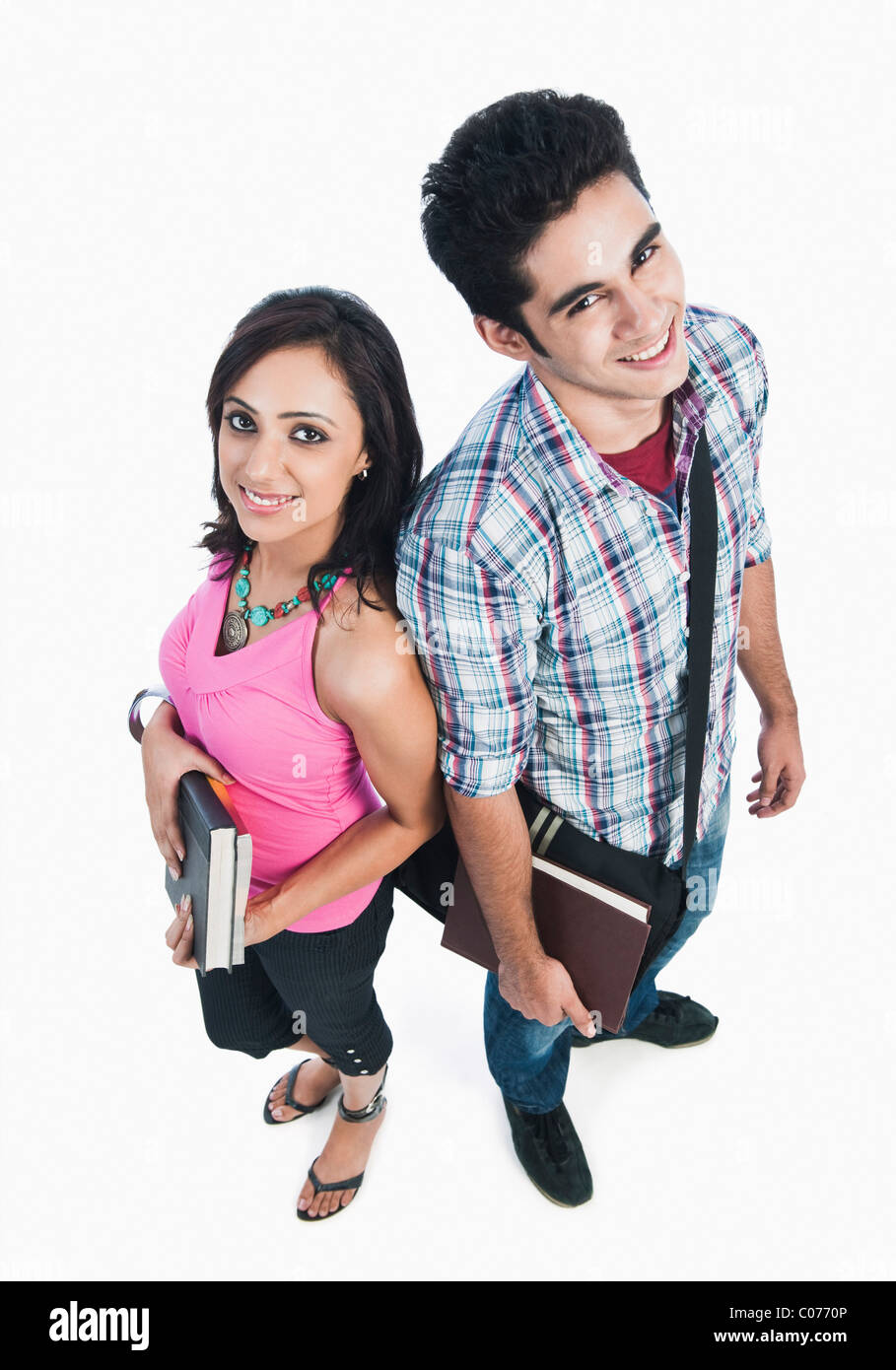 College friends smiling together Stock Photo - Alamy