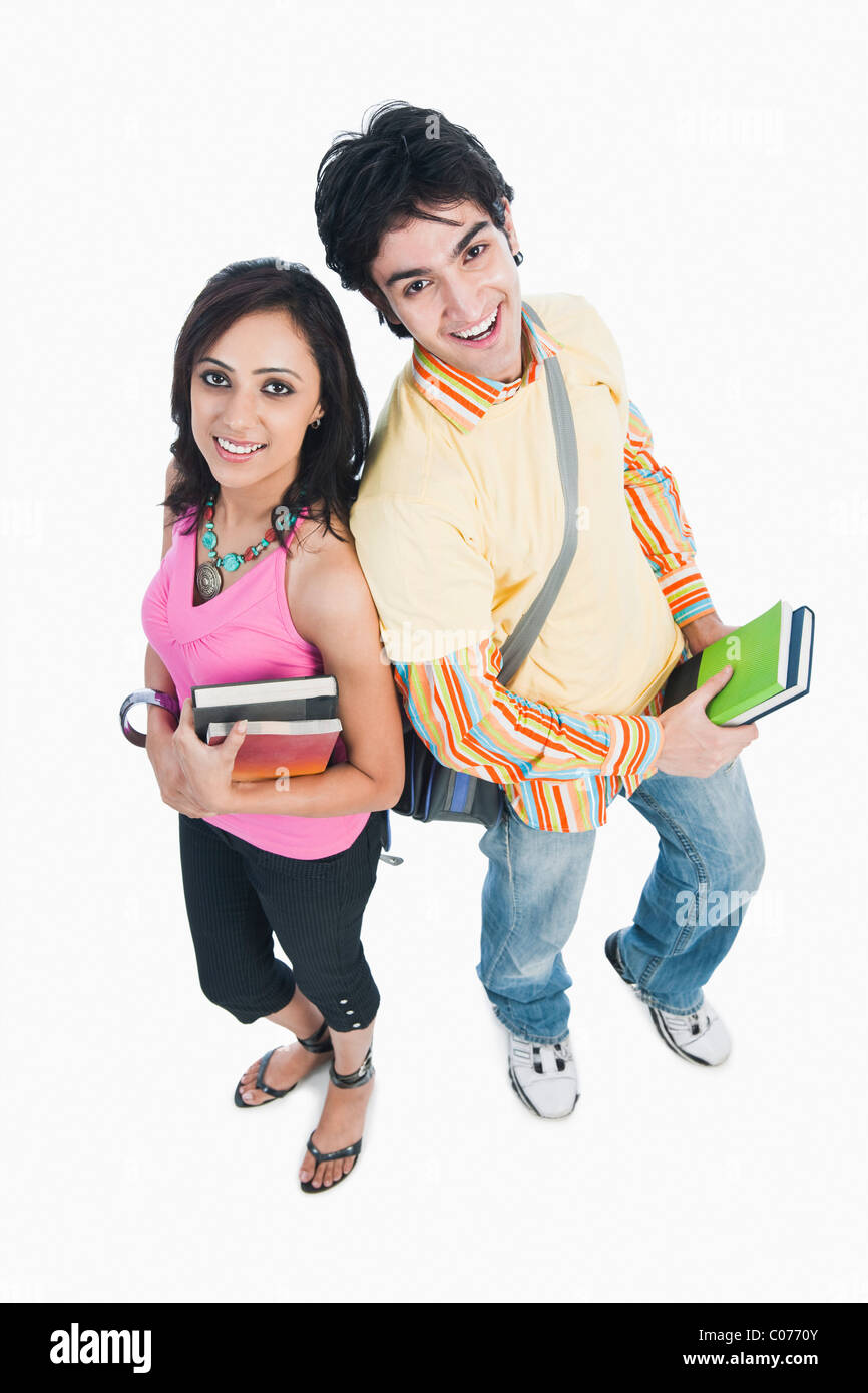 College friends smiling together Stock Photo - Alamy