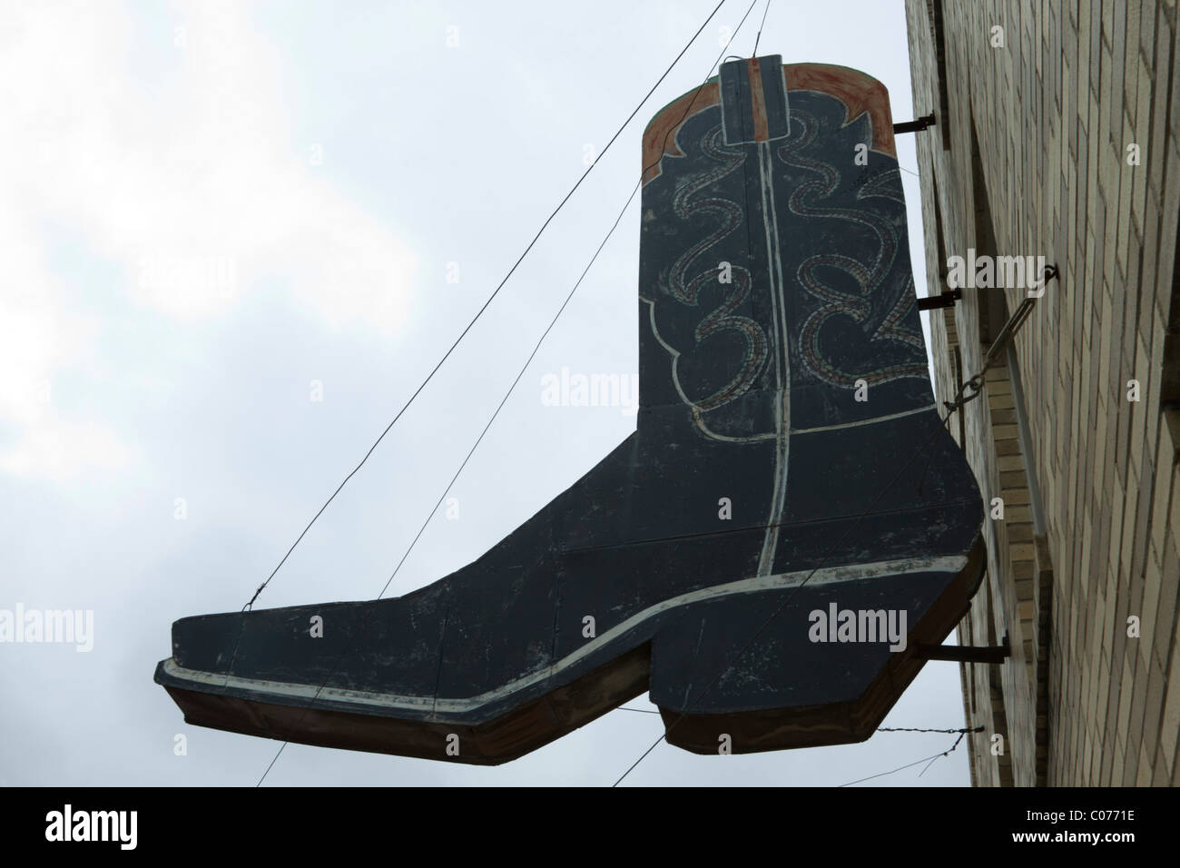 A Large Cowboy Boot Hanging outside a Boot maker in Austin Texas Stock ...
