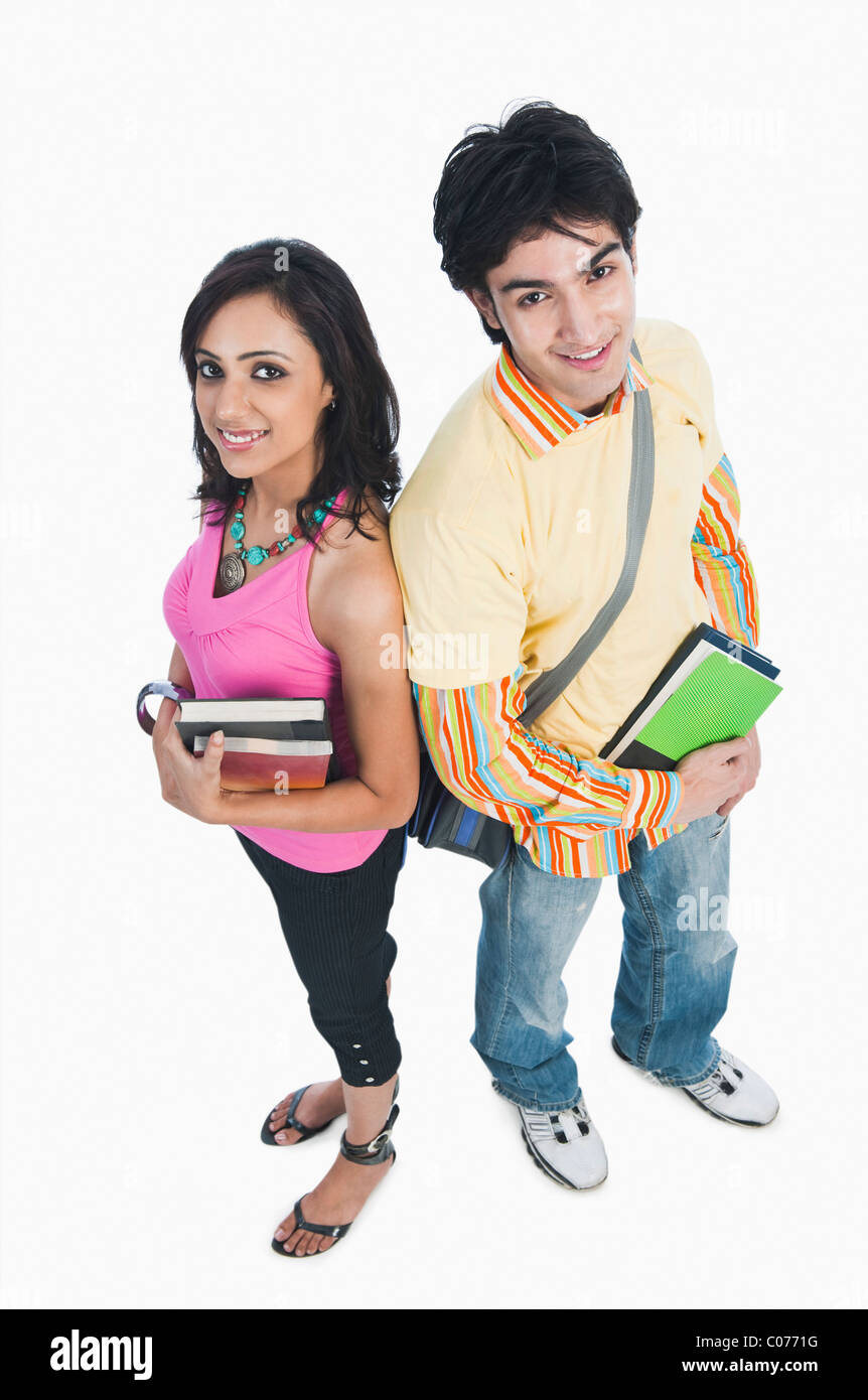 College friends smiling together Stock Photo - Alamy