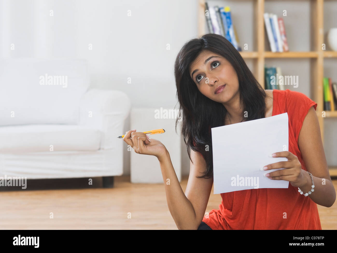 Woman sorting out clothing hi-res stock photography and images - Alamy