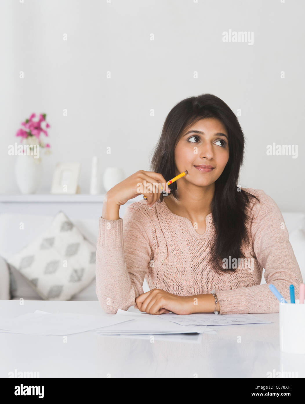Woman day dreaming Stock Photo - Alamy