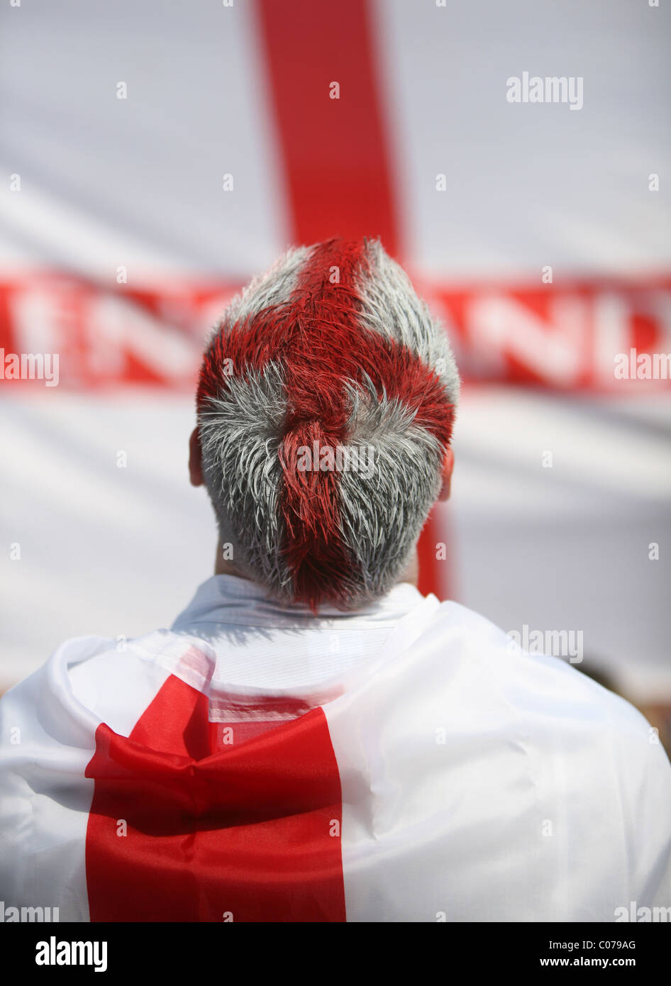 A man dressed in a St Georges flag on St Georges Day in England Stock ...