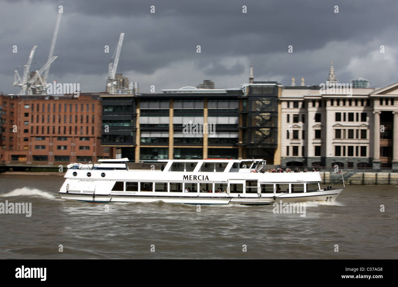 A tourist cruise boat on the River Thames in London Stock Photo - Alamy