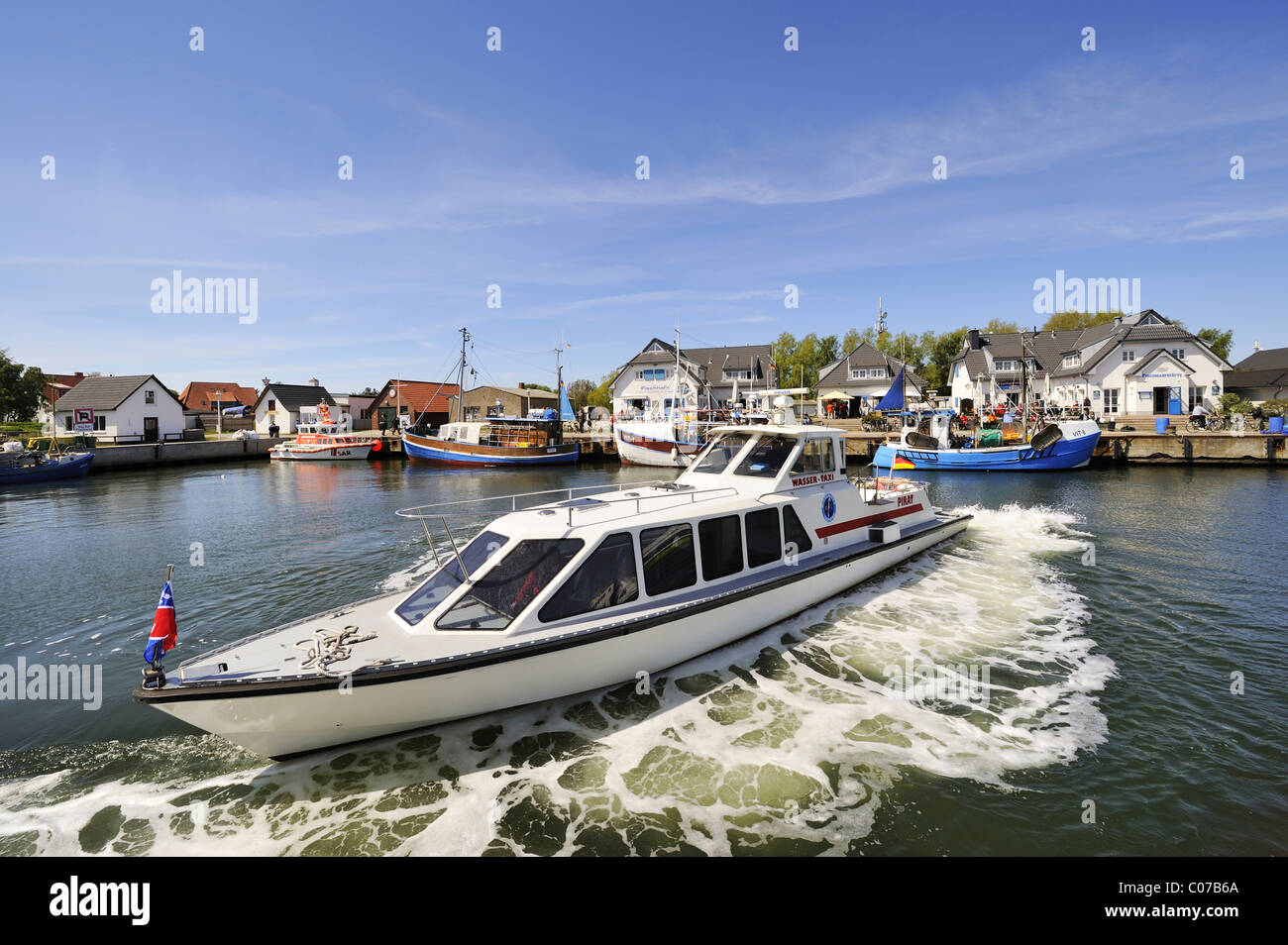 Water taxi "MY Pirat" in a turning maneuvre in the harbour of Vitte ...