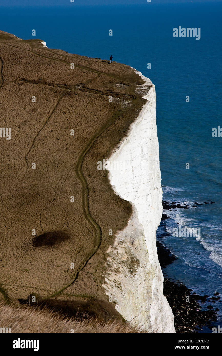 Man on a cliff top looking out to sea hi-res stock photography and ...