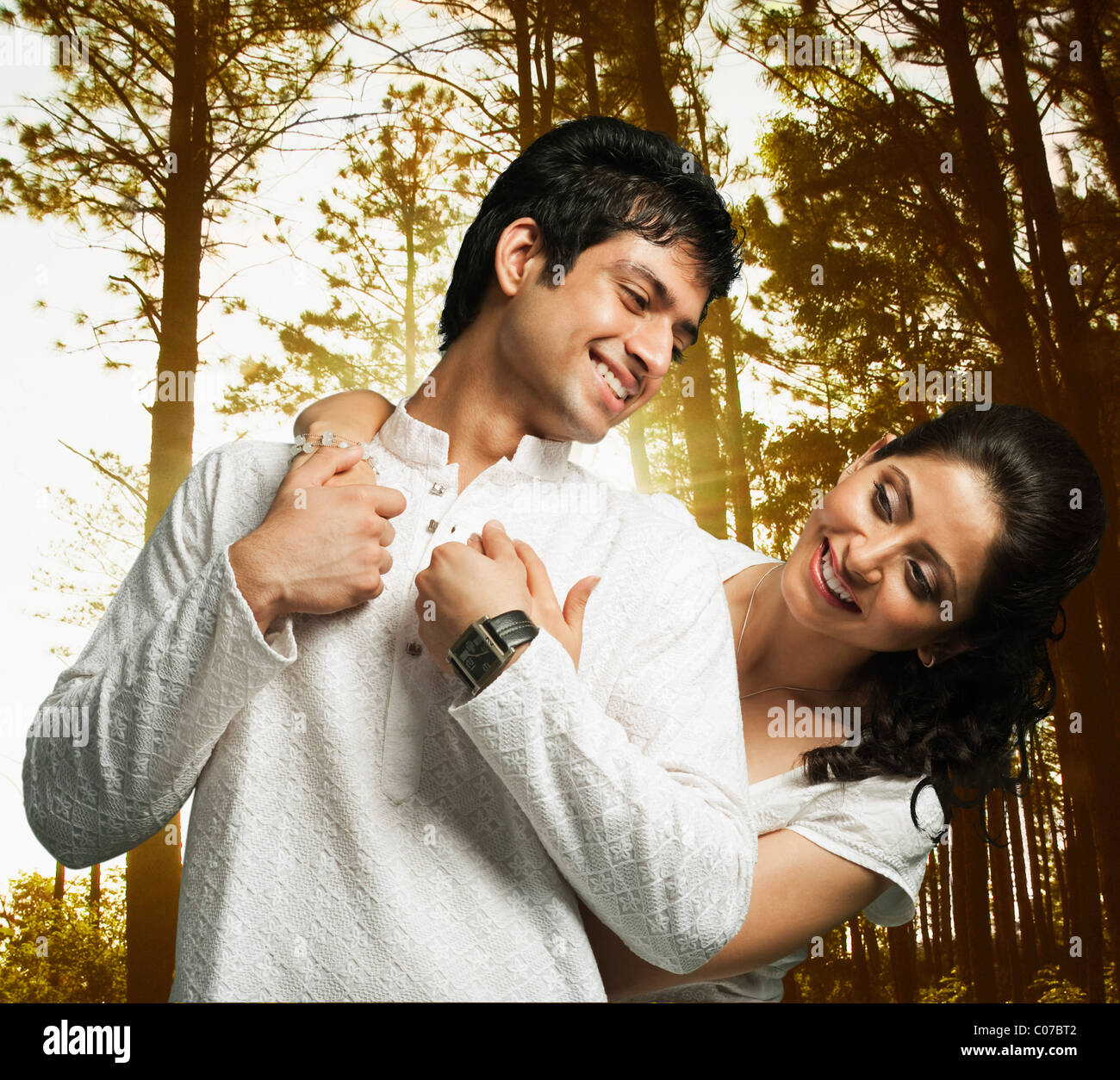Romantic couple in a forest Stock Photo - Alamy