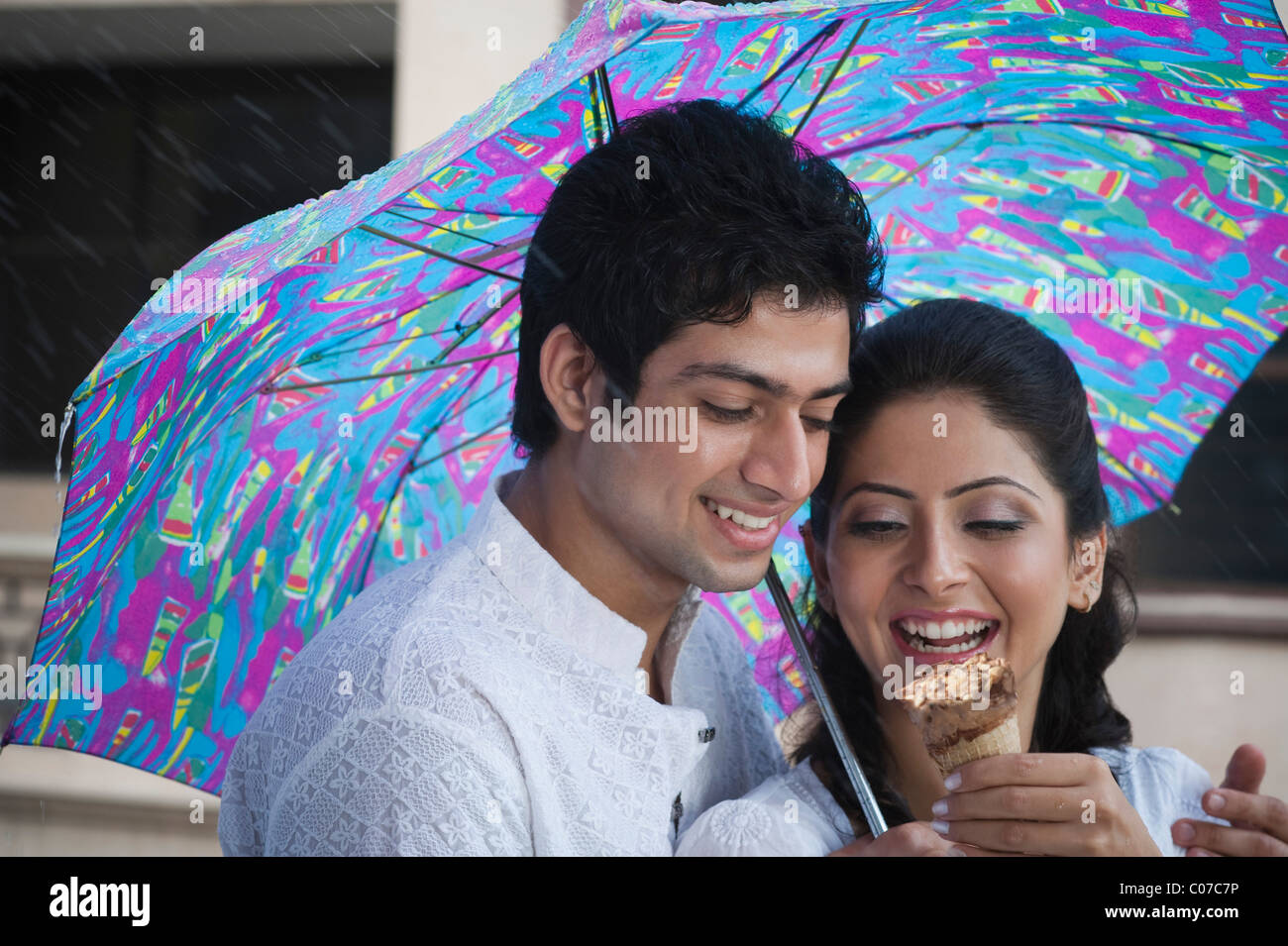 Couple with an ice cream Stock Photo - Alamy