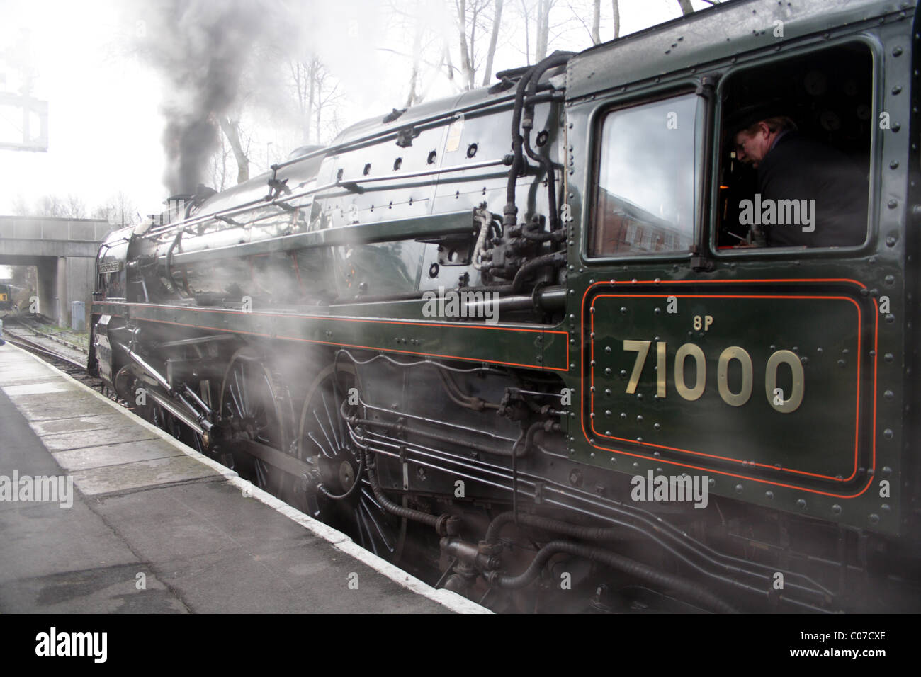Steam locomotive 71000, Duke of Gloucester, leaving a station Stock ...