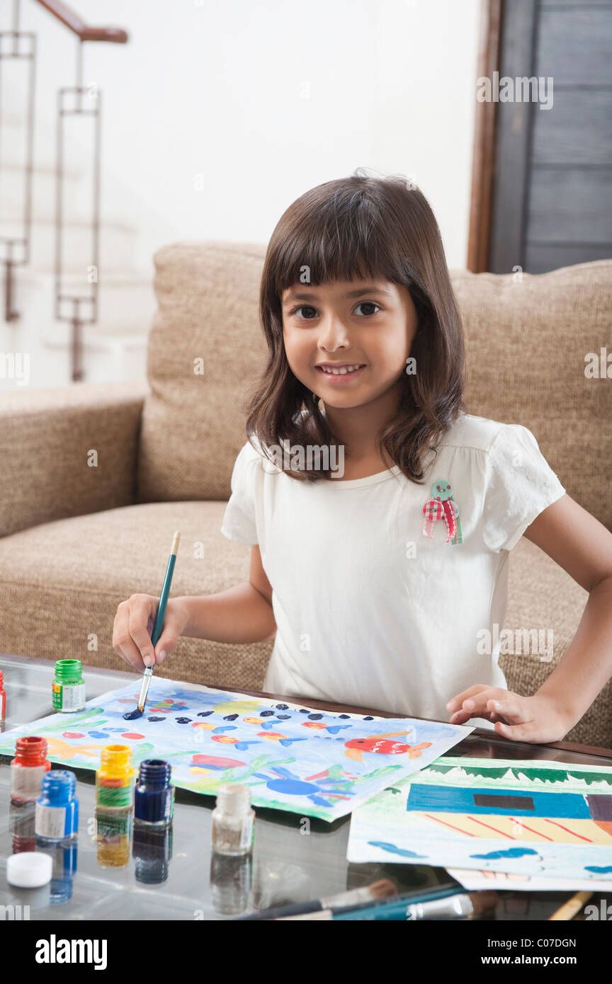 Portrait of a girl painting Stock Photo - Alamy