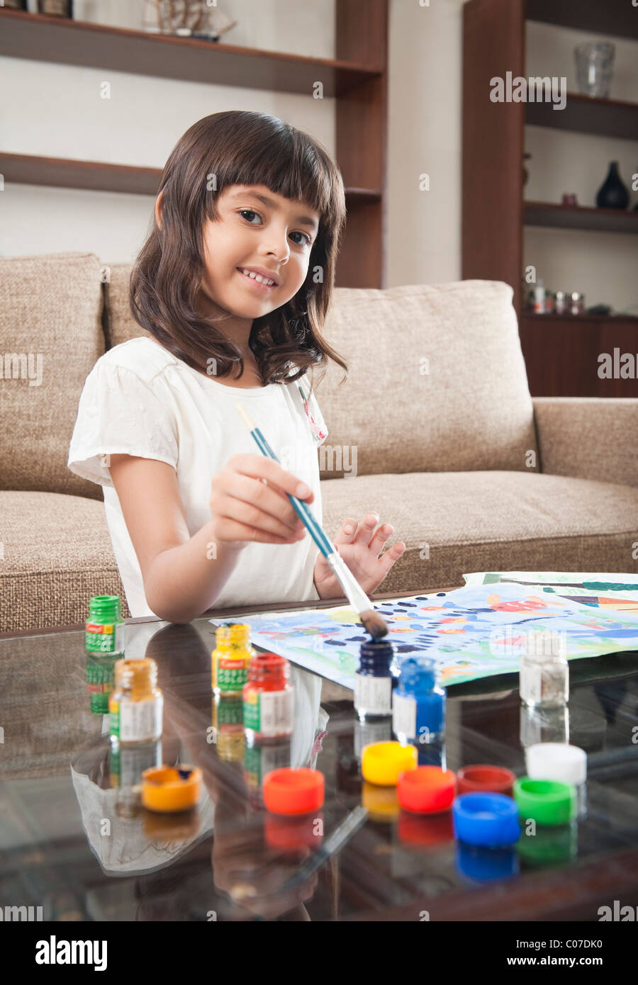 Portrait of a girl painting Stock Photo - Alamy