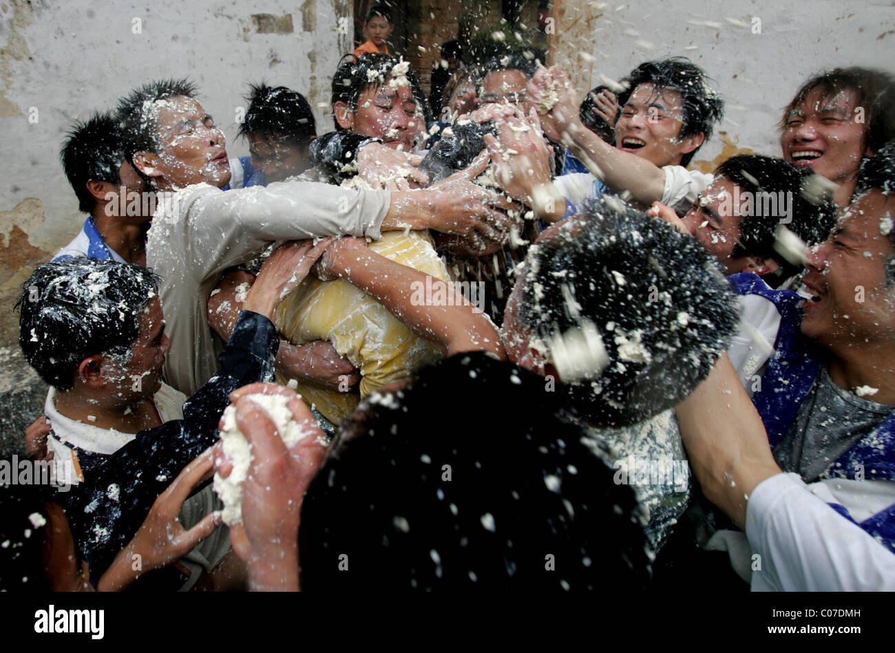 FOOD FIGHT FUN Everyone has fun at the annual grand bean-curd throwing ...