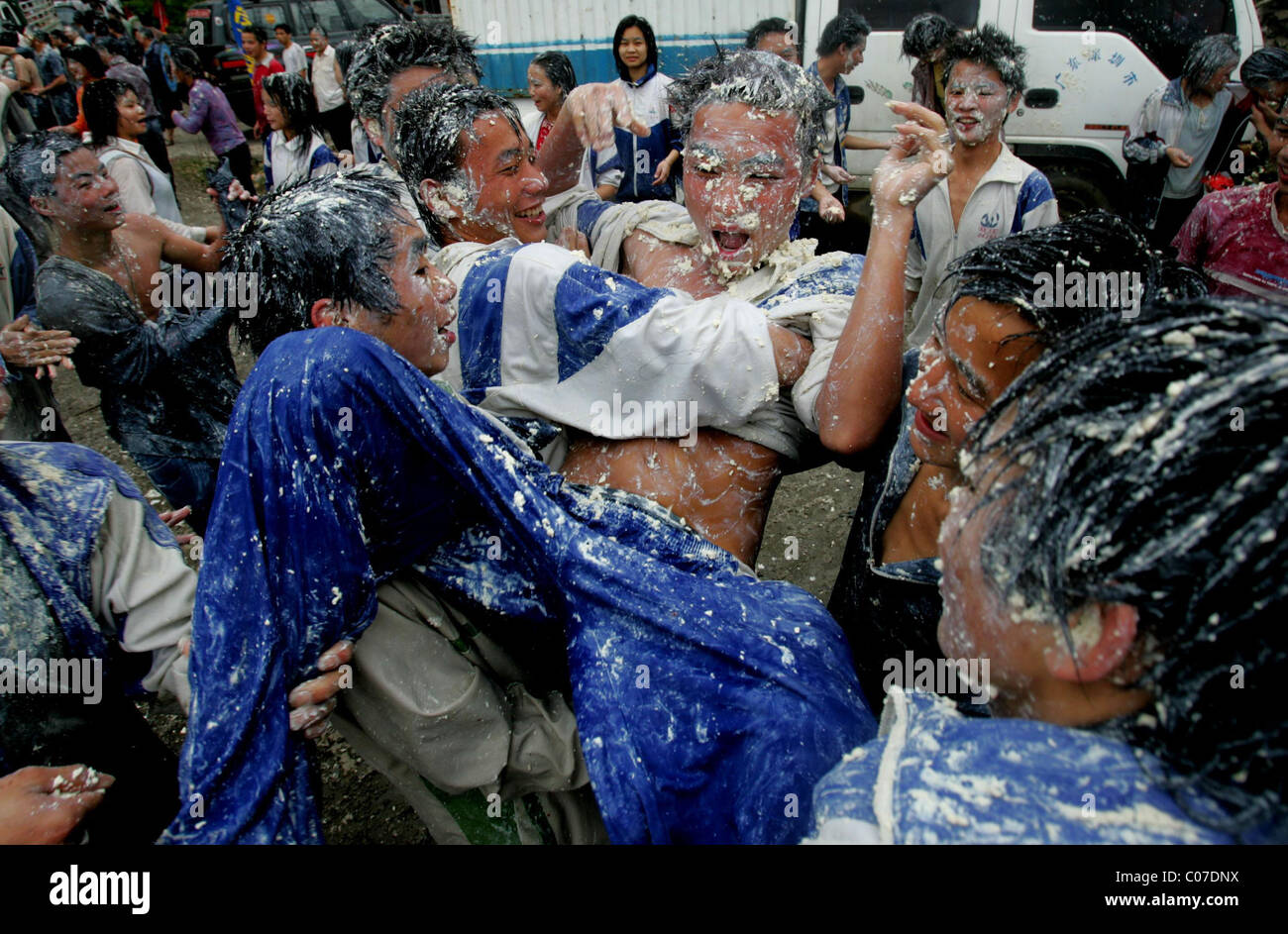 FOOD FIGHT FUN Everyone has fun at the annual grand bean-curd throwing ...