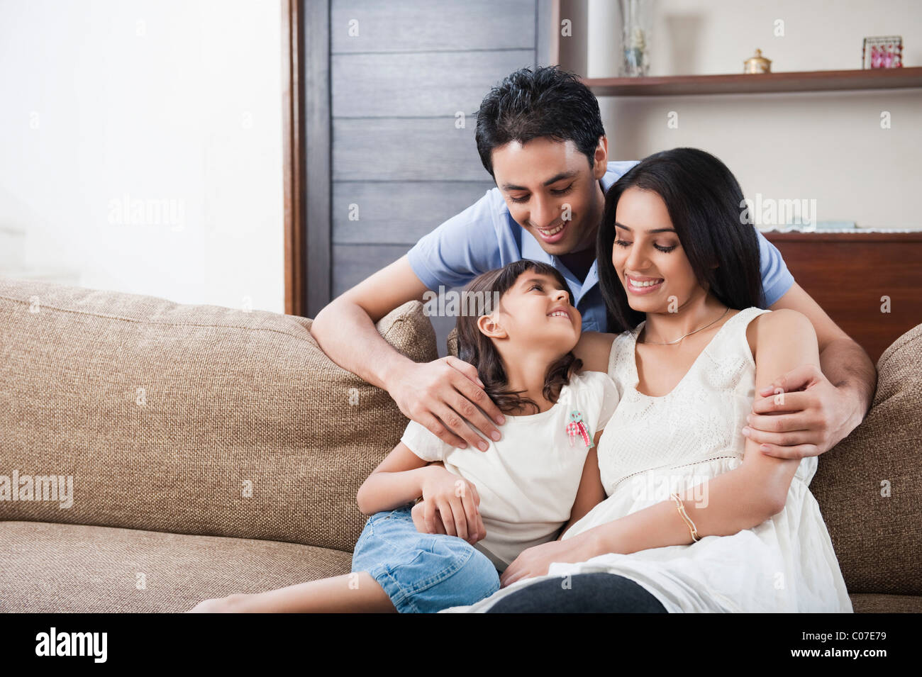 Family smiling together Stock Photo - Alamy