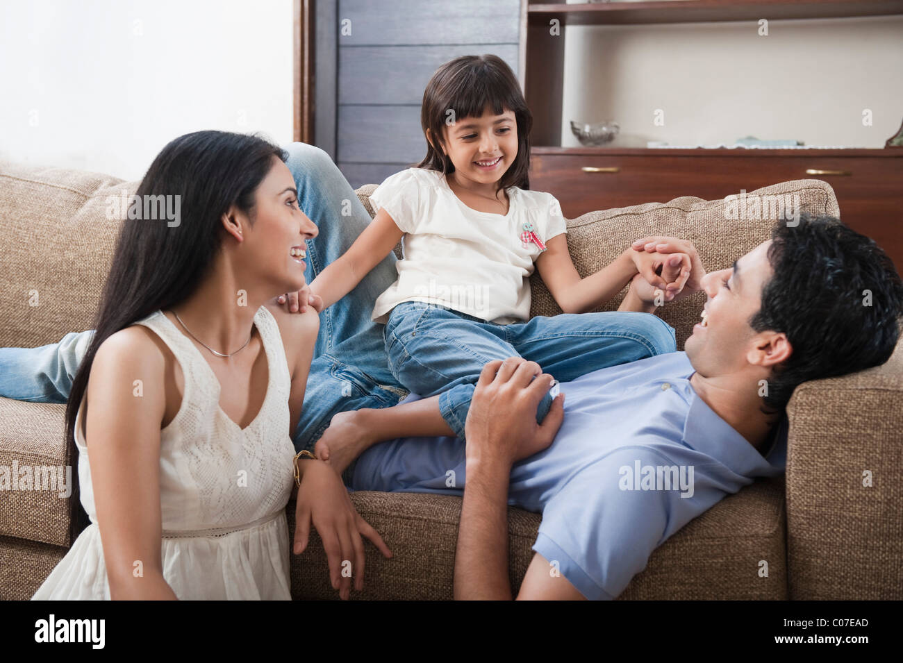 Family smiling together Stock Photo - Alamy