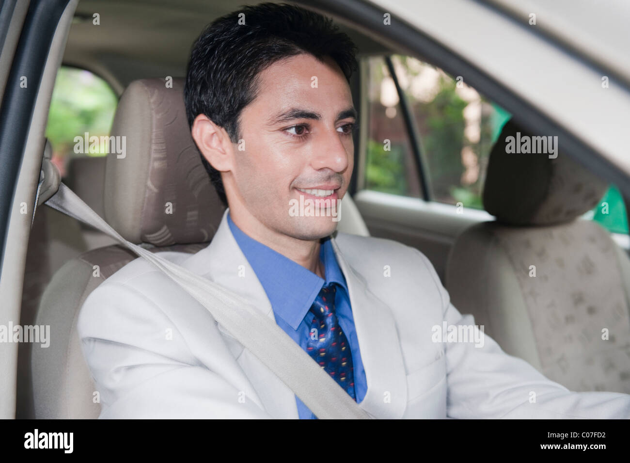 Indian man driving car hi-res stock photography and images - Alamy
