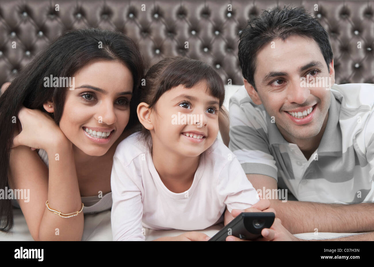 Family watching television Stock Photo - Alamy