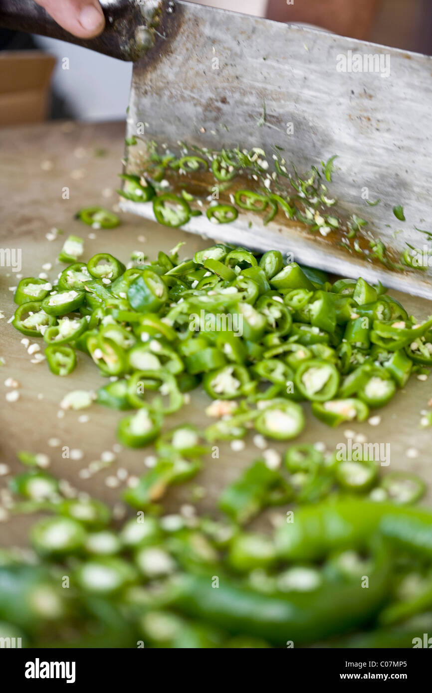Chillies being chopped hi-res stock photography and images - Alamy